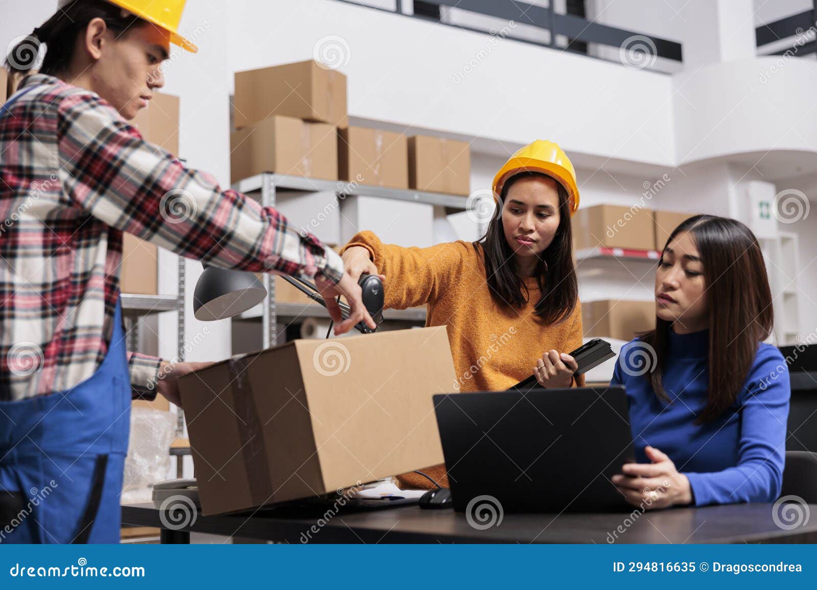 Package Handler and Delivery Operators Preparing Parcel for Shipment ...
