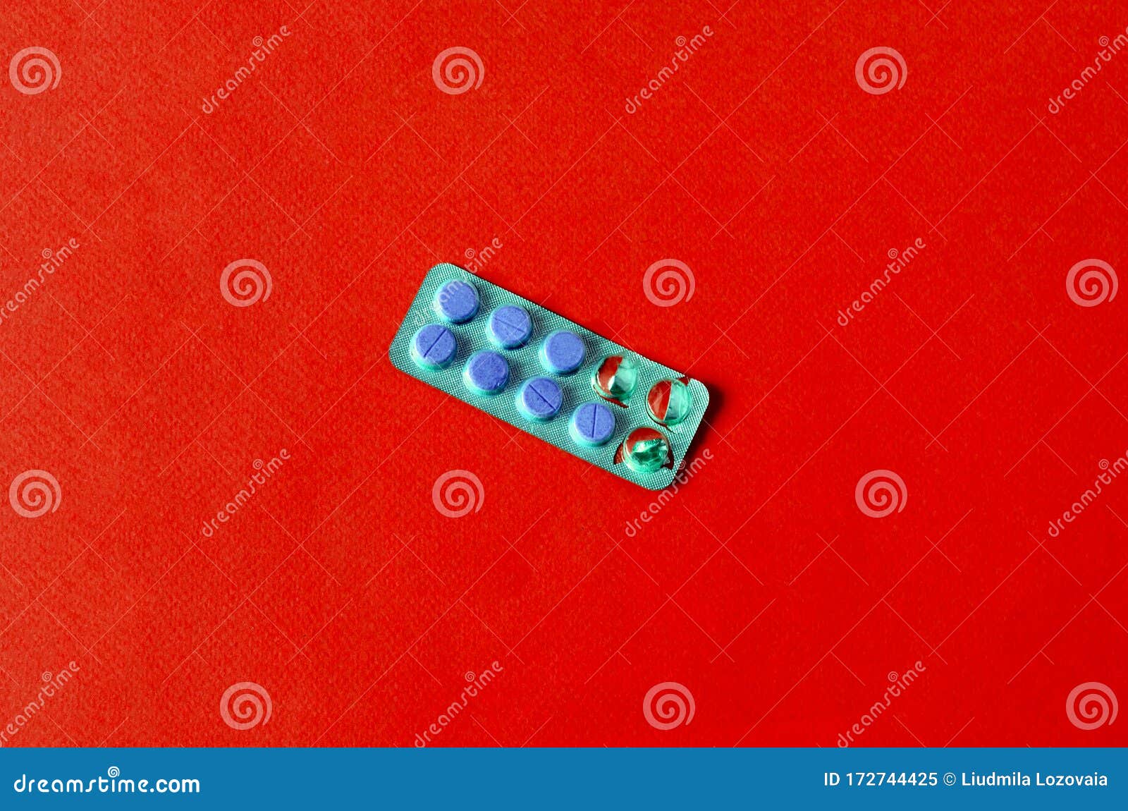 Package of Opened Purple Tablets on a Red Background Stock Image ...