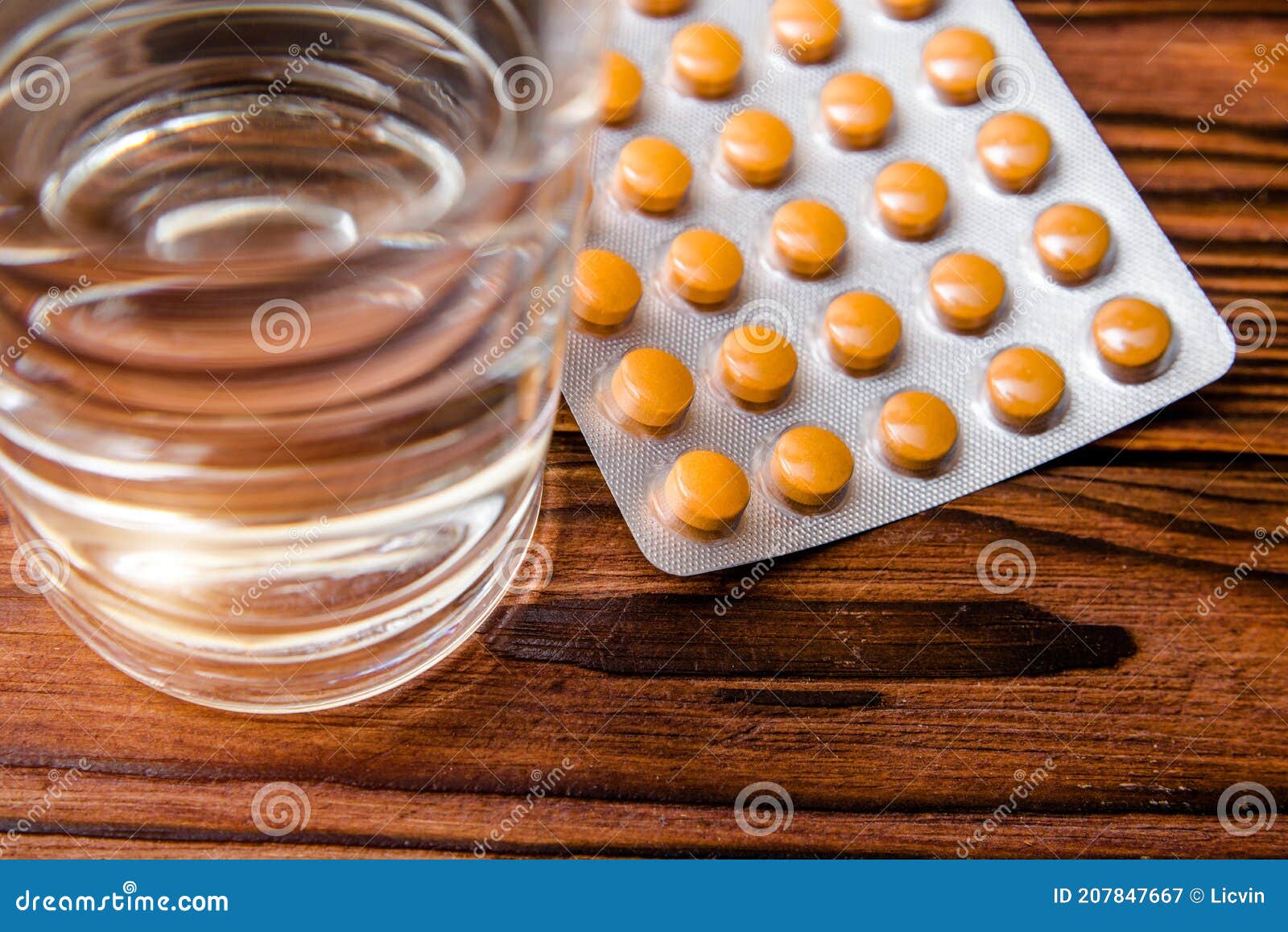 A Package of Orange Tablets Stock Image - Image of glass, medication ...