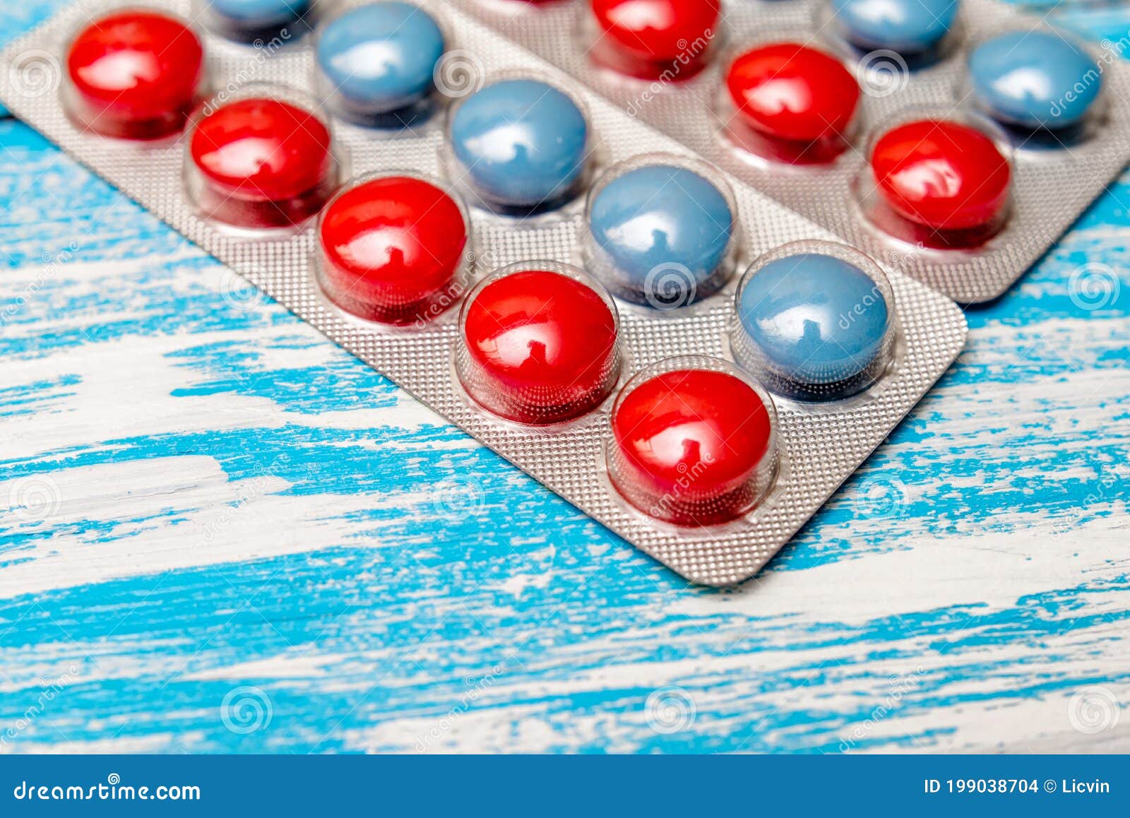 A Package of Red and Blue Tablets Stock Photo - Image of tablet ...