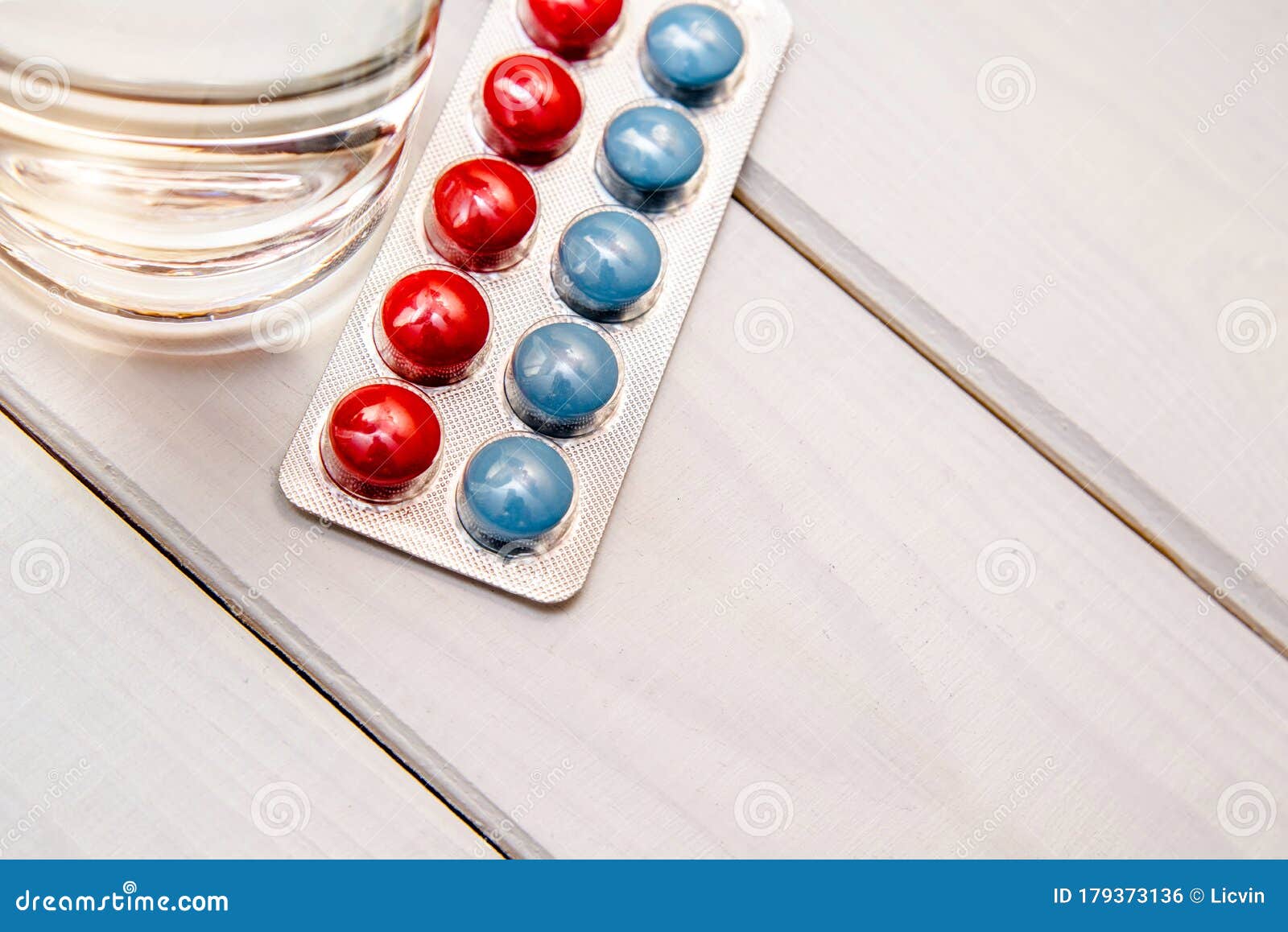 A Package of Red and Blue Tablets Stock Photo - Image of illness ...