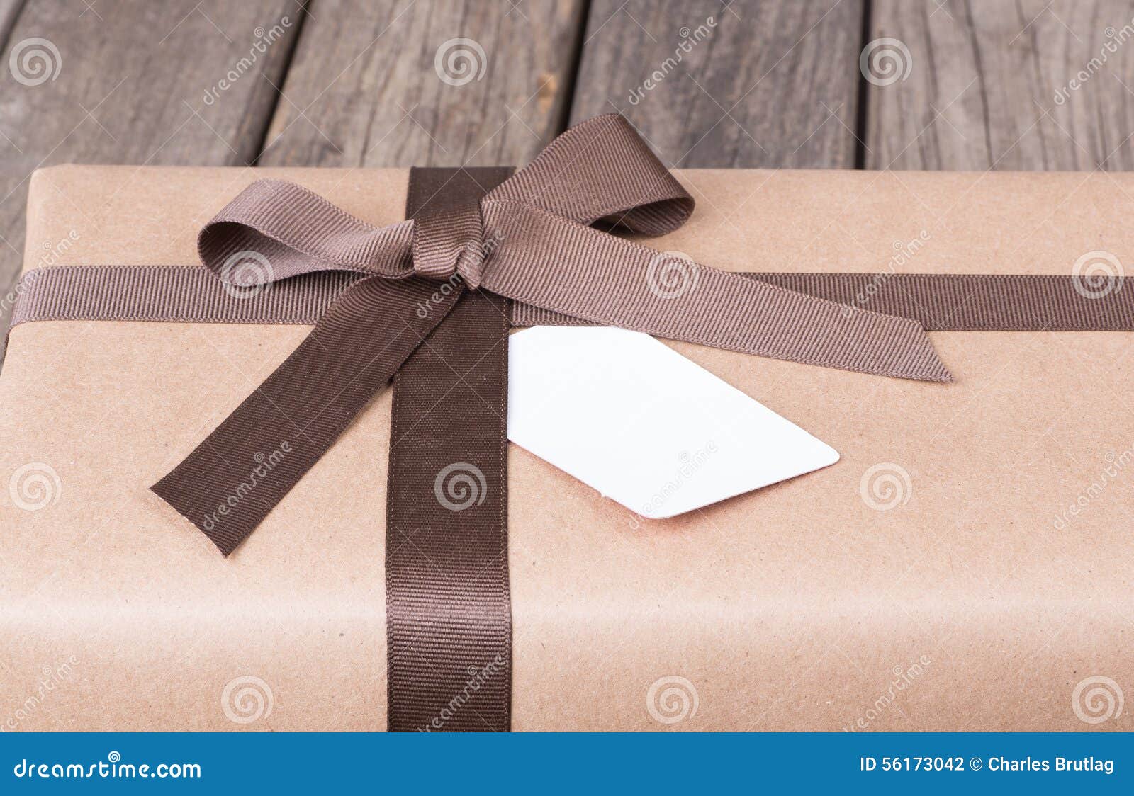 Package with Ribbon and Bow Stock Photo - Image of brown, surprise ...