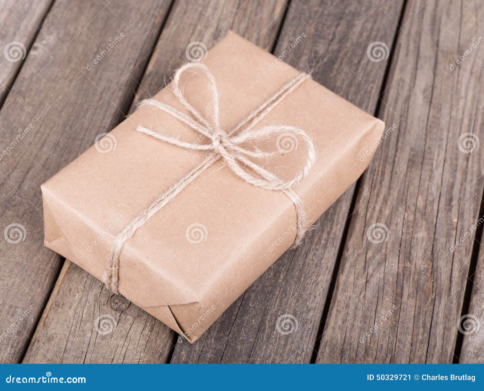 Package Wrapped in Brown Paper and String Stock Image - Image of single ...