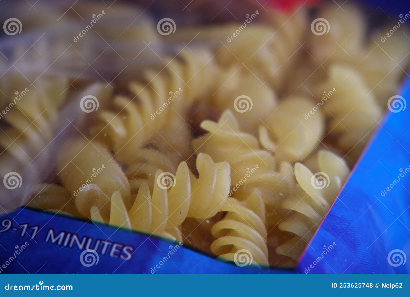 Packaged Pasta. a Close-up View of the Macaroni through the Packaging ...