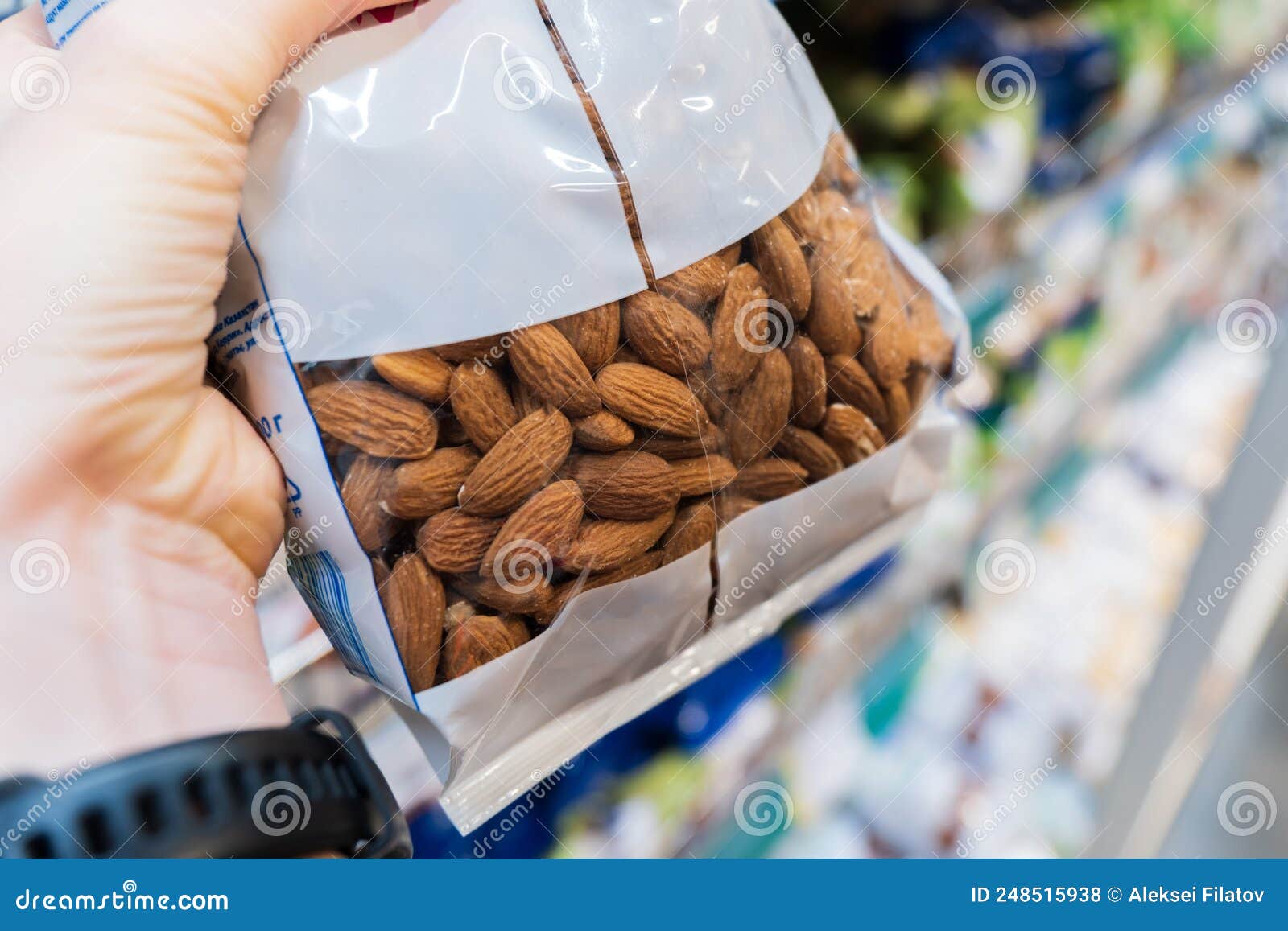 Packaged Snacks Almonds on the Shelves of the Hypermarket. a Healthy ...