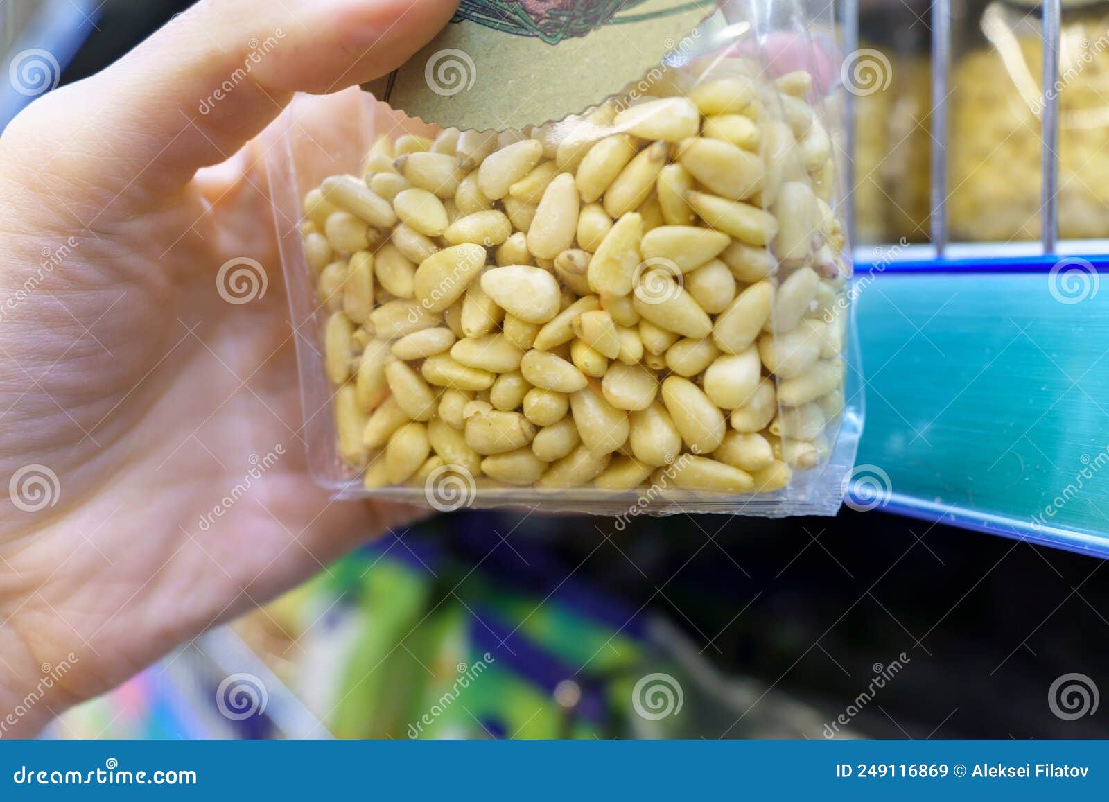 Packaged Snacks Pine Nuts on the Shelves of the Hypermarket. a Healthy ...