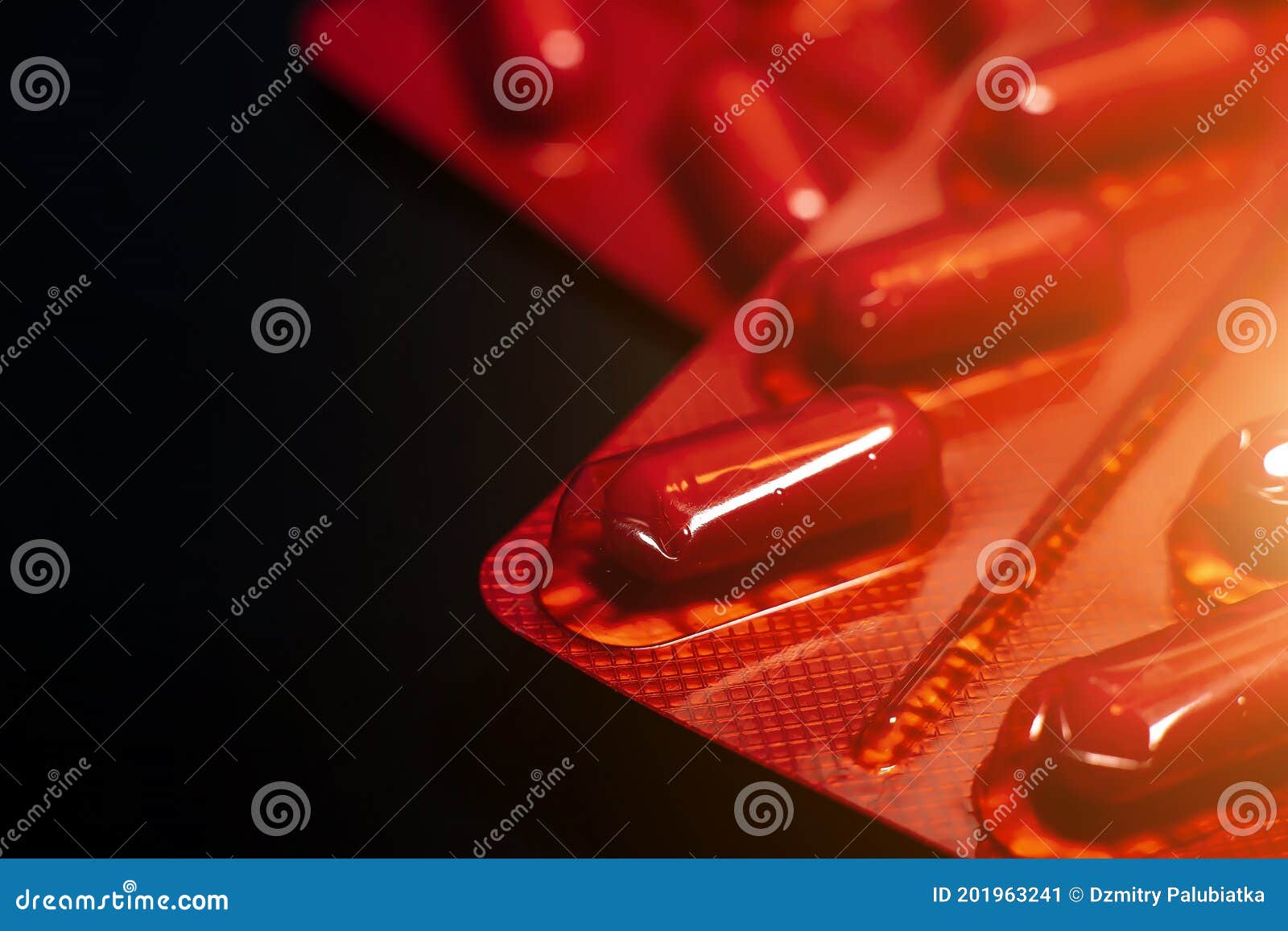 Packages of Tablets in a Red Wrapper on a Black Background Stock Image ...