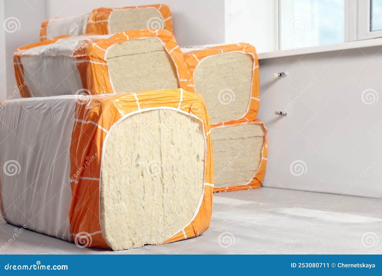 Packages of Thermal Insulation Material in Room. Space for Text Stock ...