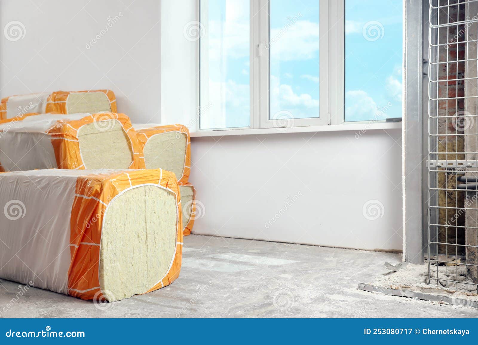 Packages of Thermal Insulation Material in Room. Space for Text Stock ...