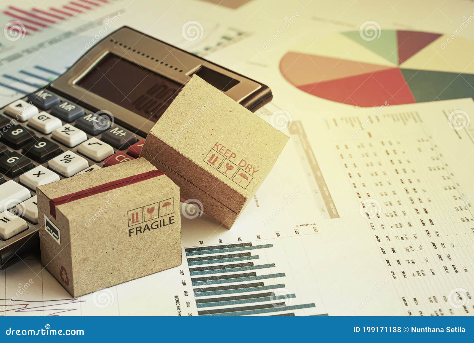 Packaging Boxes with Calculator and this Type of Financial Charts ...