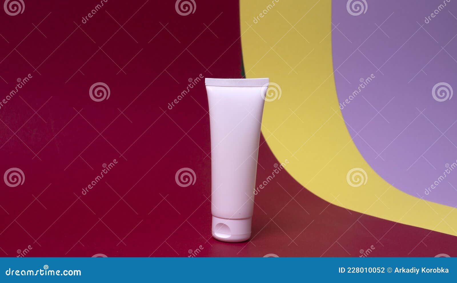 Packaging of Face or Hand Cream on Colored Background Stock Photo ...