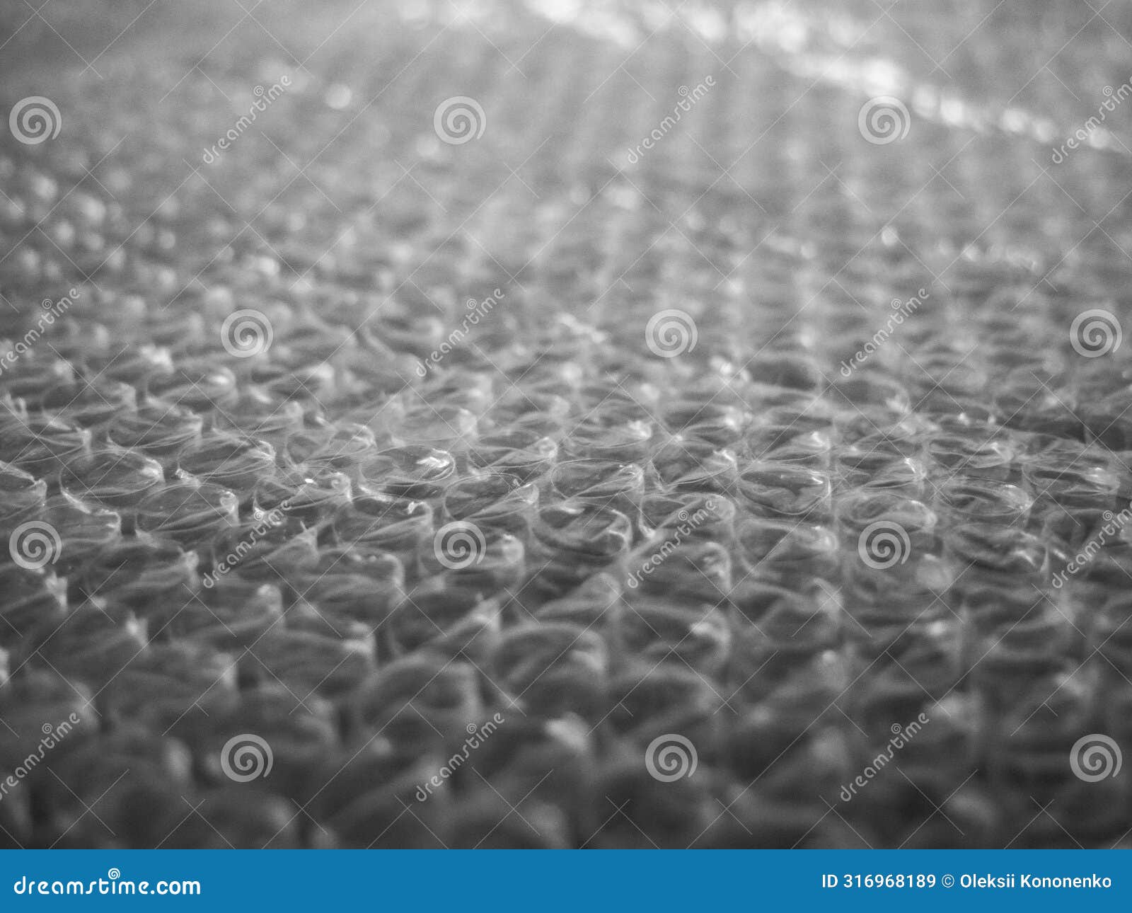 Packaging Material. Detailed View of Bubble Wrap on Green Surface Stock ...