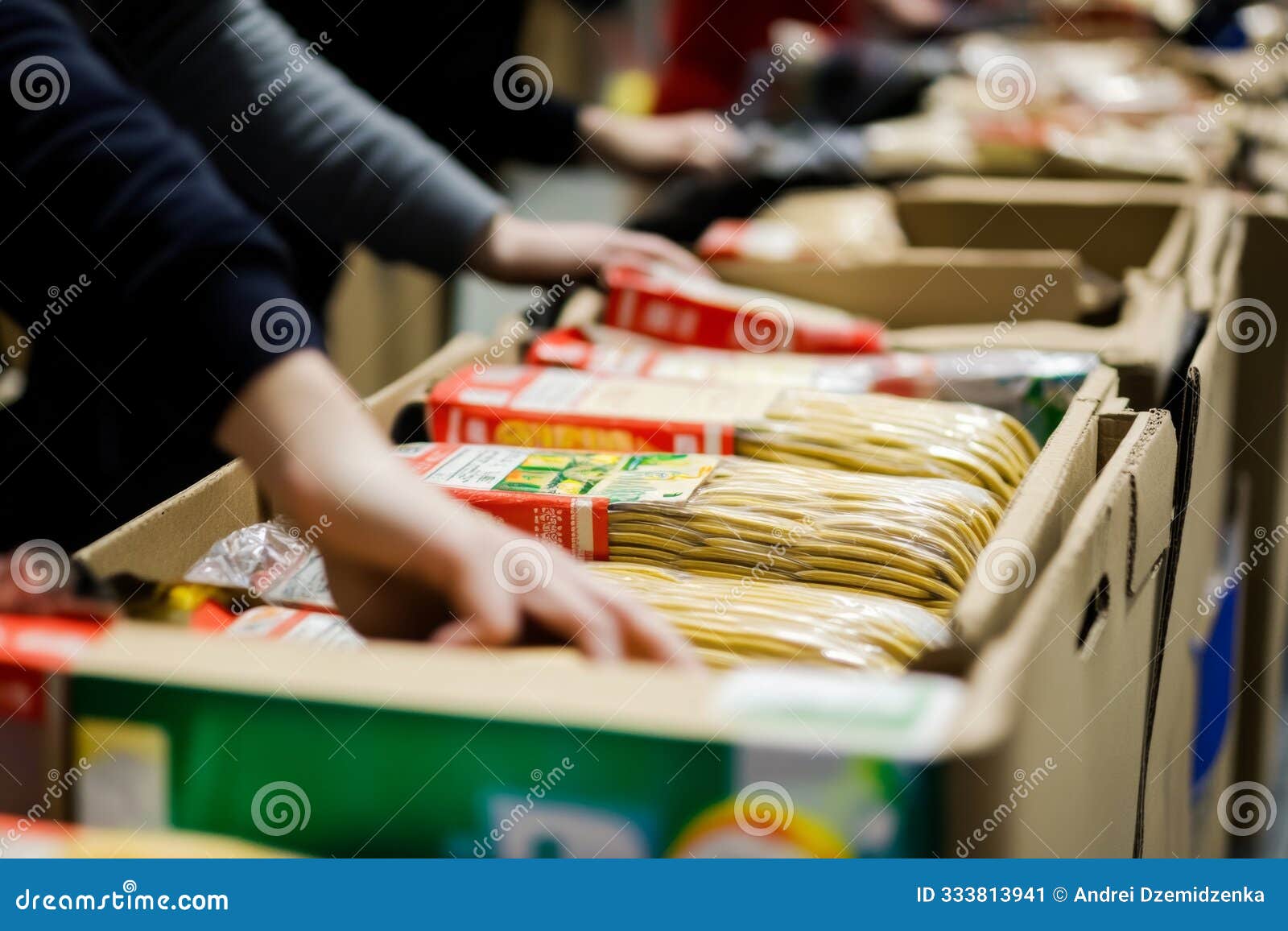 The Packaging Process is Completed by a Worker Wearing Gloves To Ensure ...