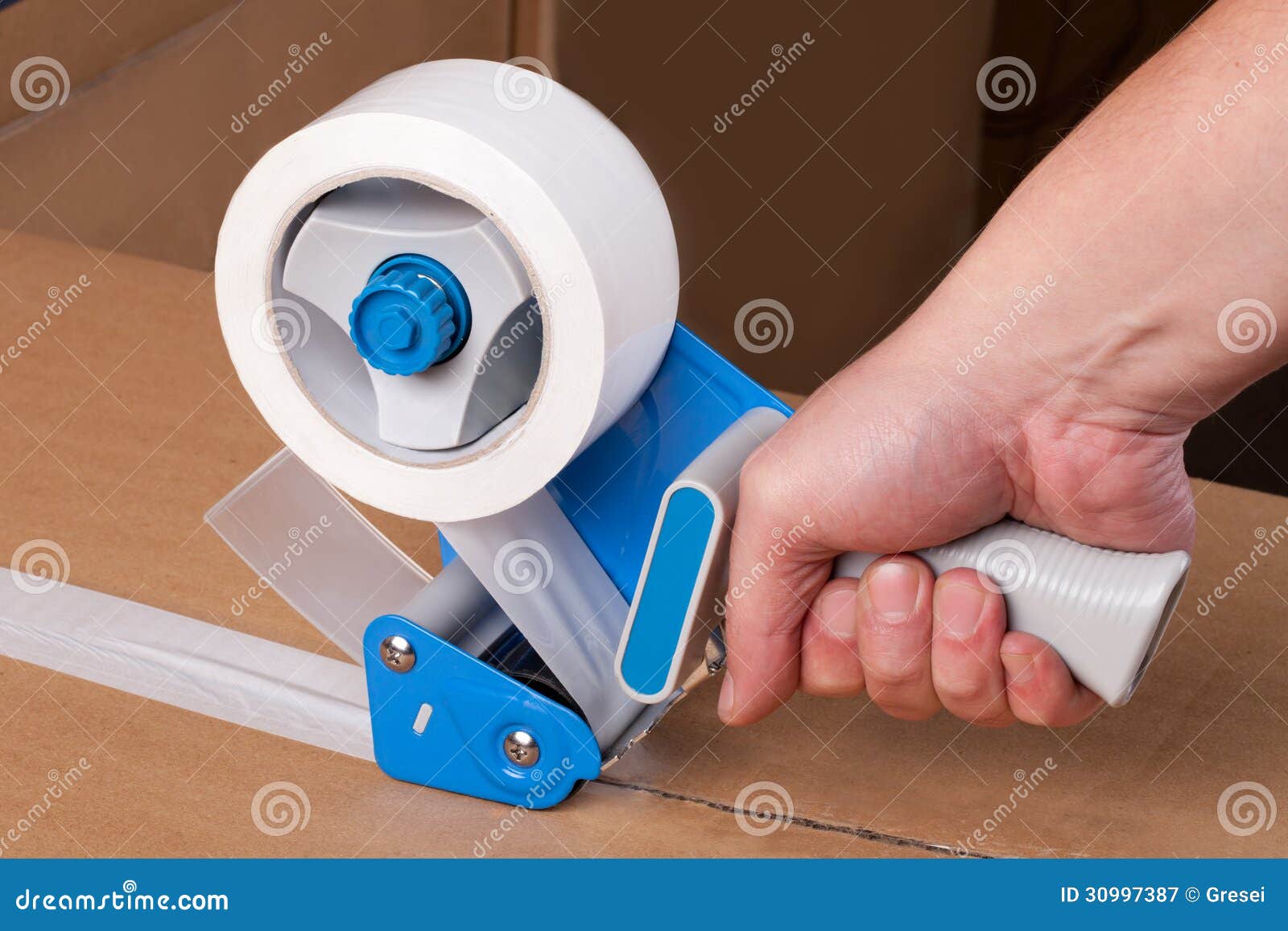 Packaging tape dispenser stock image. Image of blue, pattern - 30997387