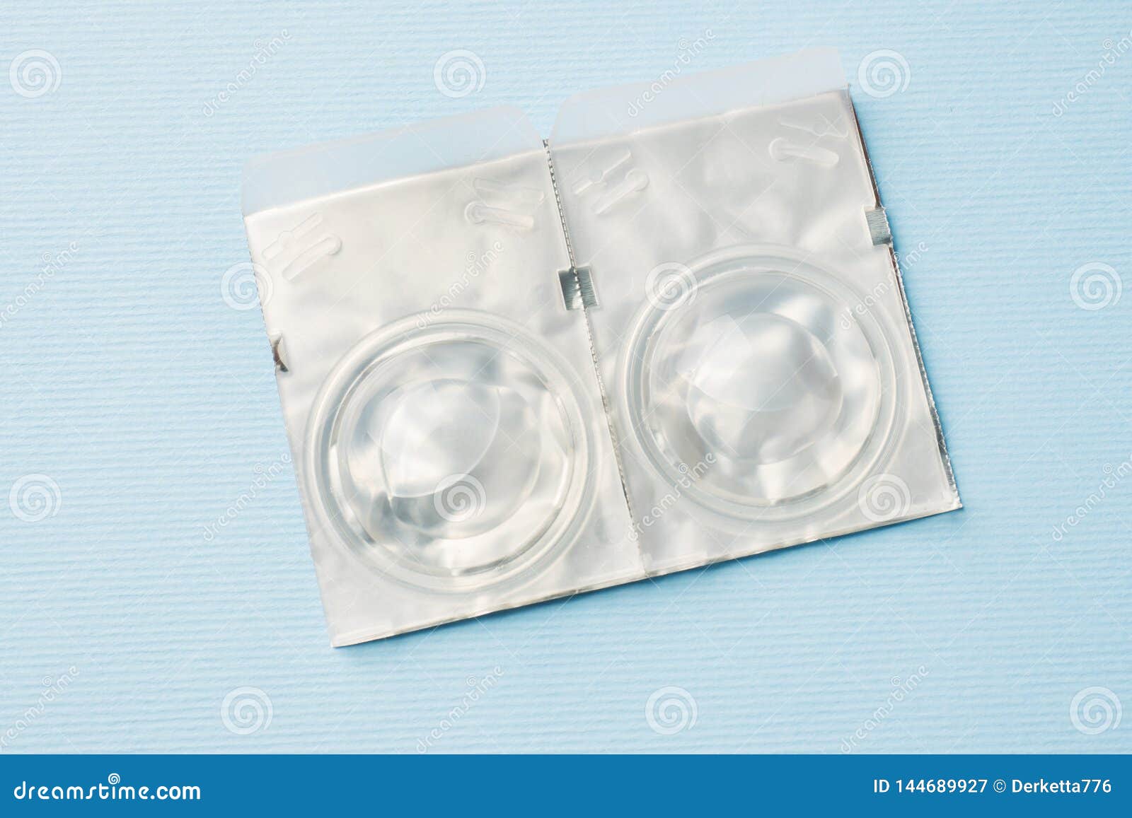 Packed Contact Lenses in Disposable Plastic Containers. Close Up Stock ...