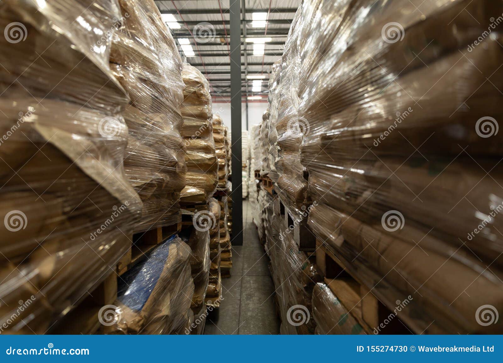 Packed Goods on a Rack in Warehouse Stock Photo - Image of plastic ...