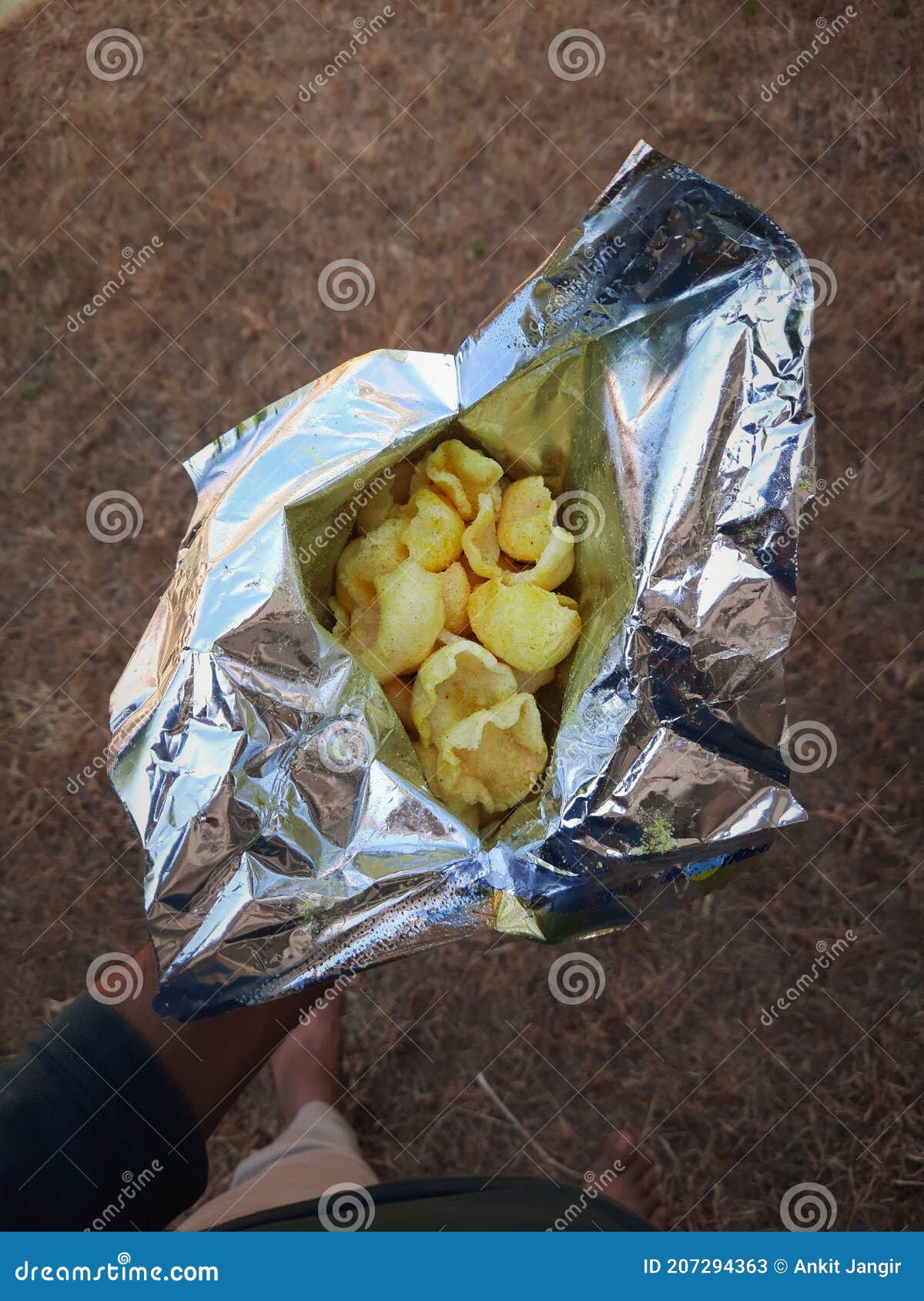 Packed Junk Food or Crispy Spicy Snacks Packet in Hand Stock Image ...