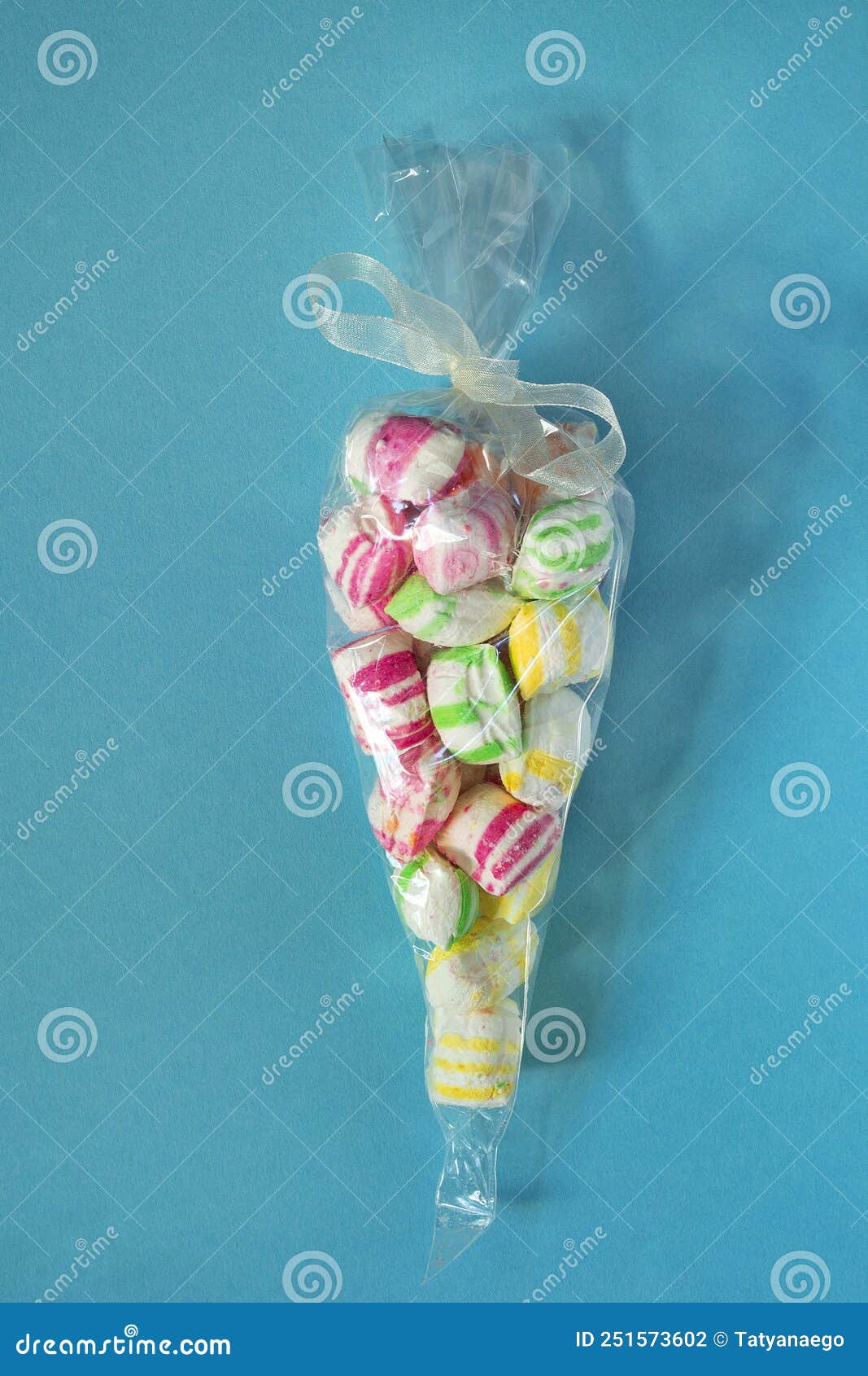 Packed marshmallow on blue stock photo. Image of confectionery - 251573602