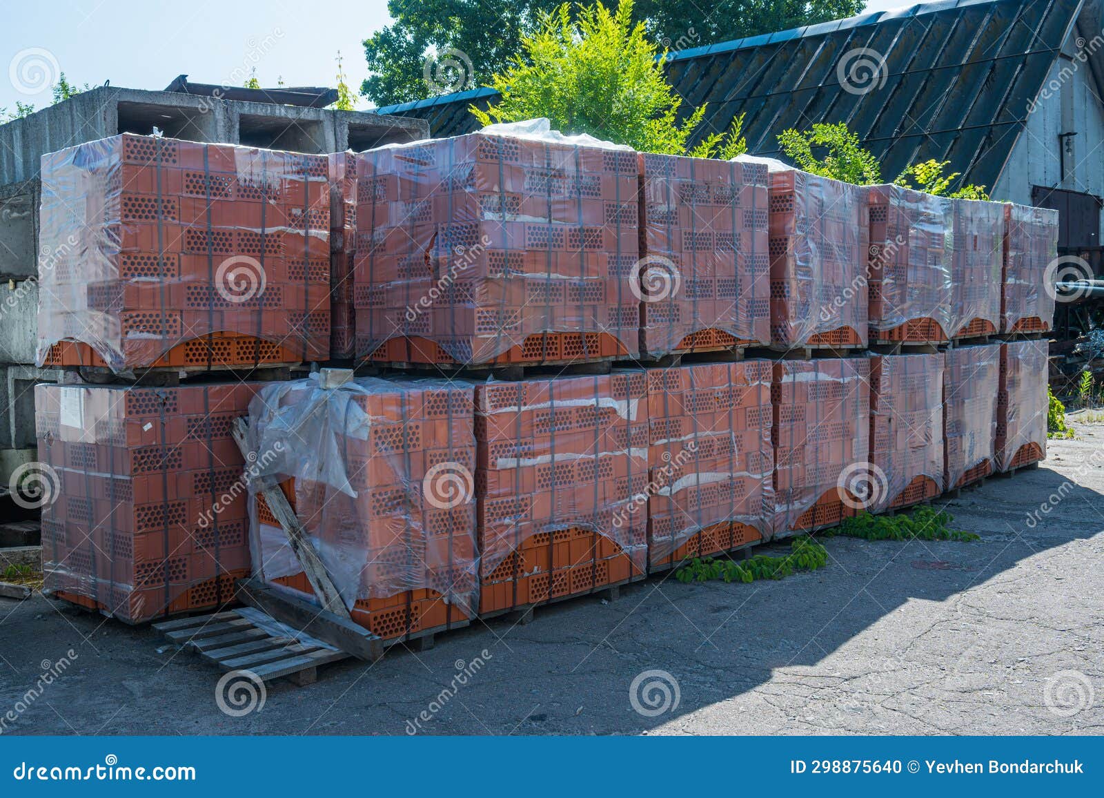 The Bricks Are Stacked On Wooden Pallets And Prepared For Sale. Clay ...