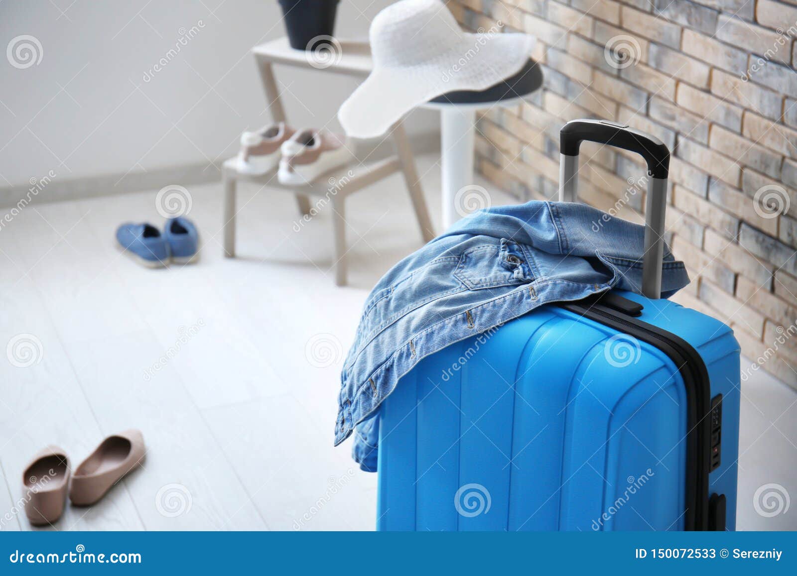 Packed Suitcase and Denim Jacket in Room Stock Image - Image of jacket ...