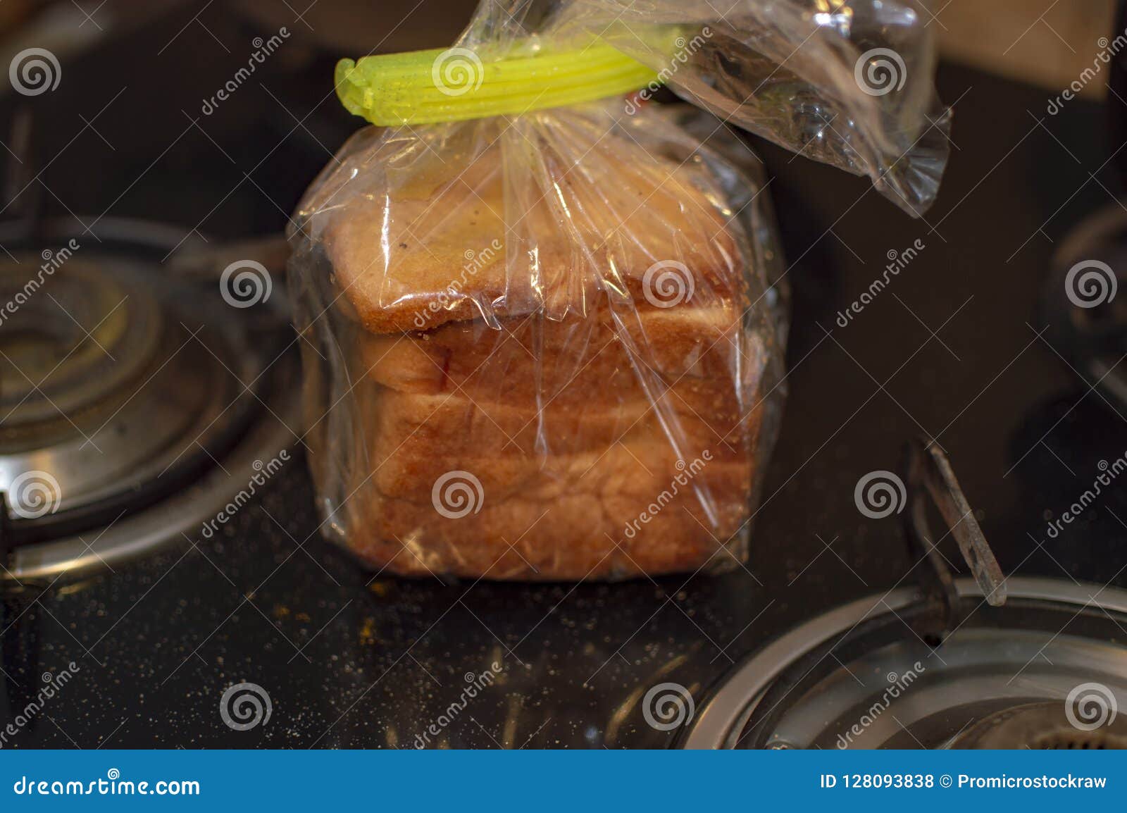 Packet of Bread Wrapped by Plastic and Tied Stock Photo - Image of ...