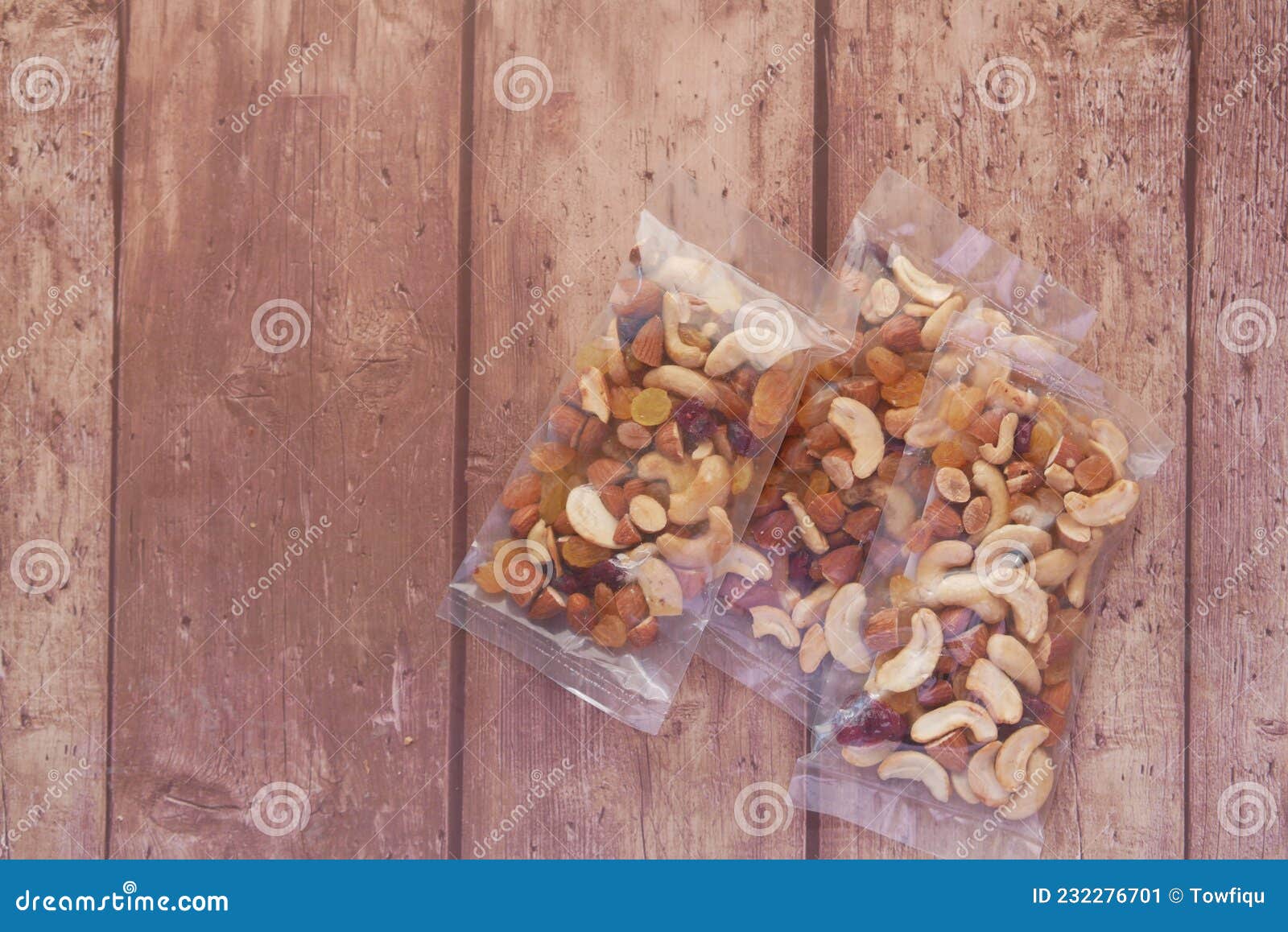 Packet of Mixed Nuts on Wooden Background Stock Image - Image of almond ...