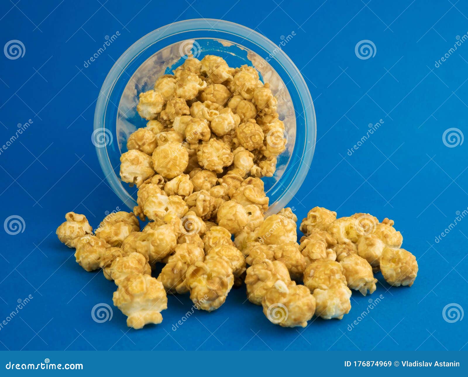 A Packet of Sweet Popcorn , Dropped on Its Side, on a Blue Background ...