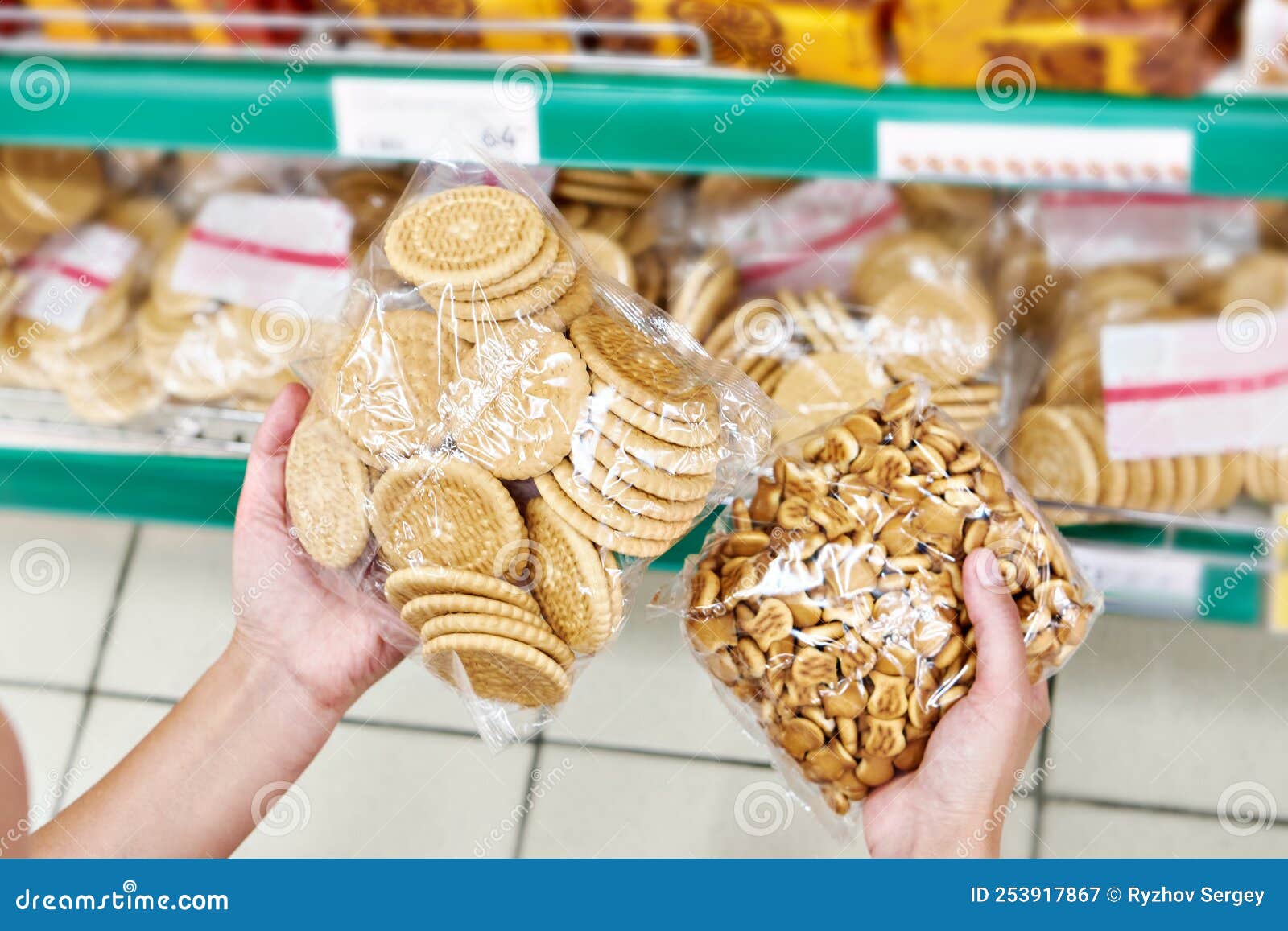 Packets of Cookies in Hands of Buyer Stock Image - Image of food, shop ...