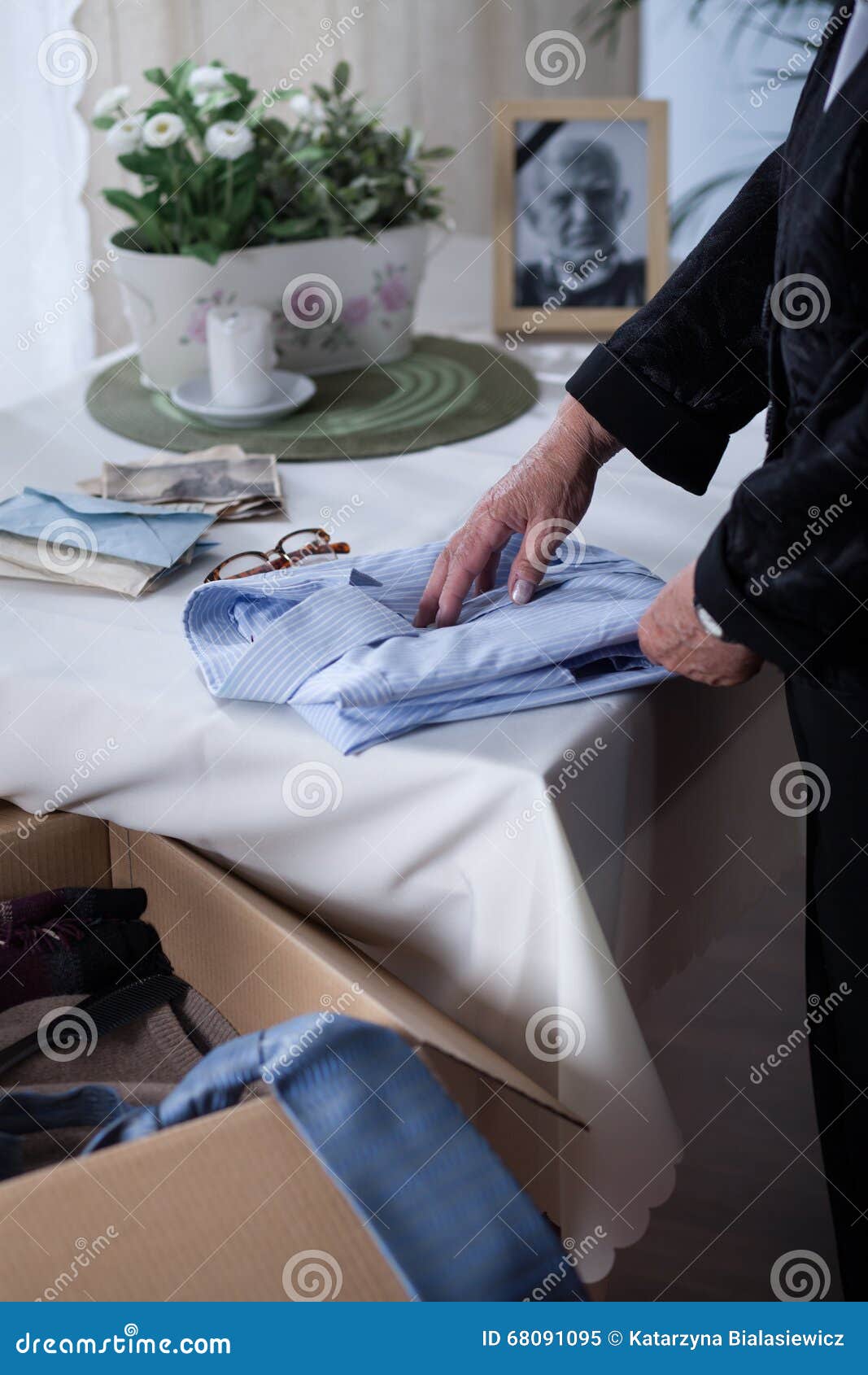 Packing away clothes stock image. Image of clothing, mourn - 68091095