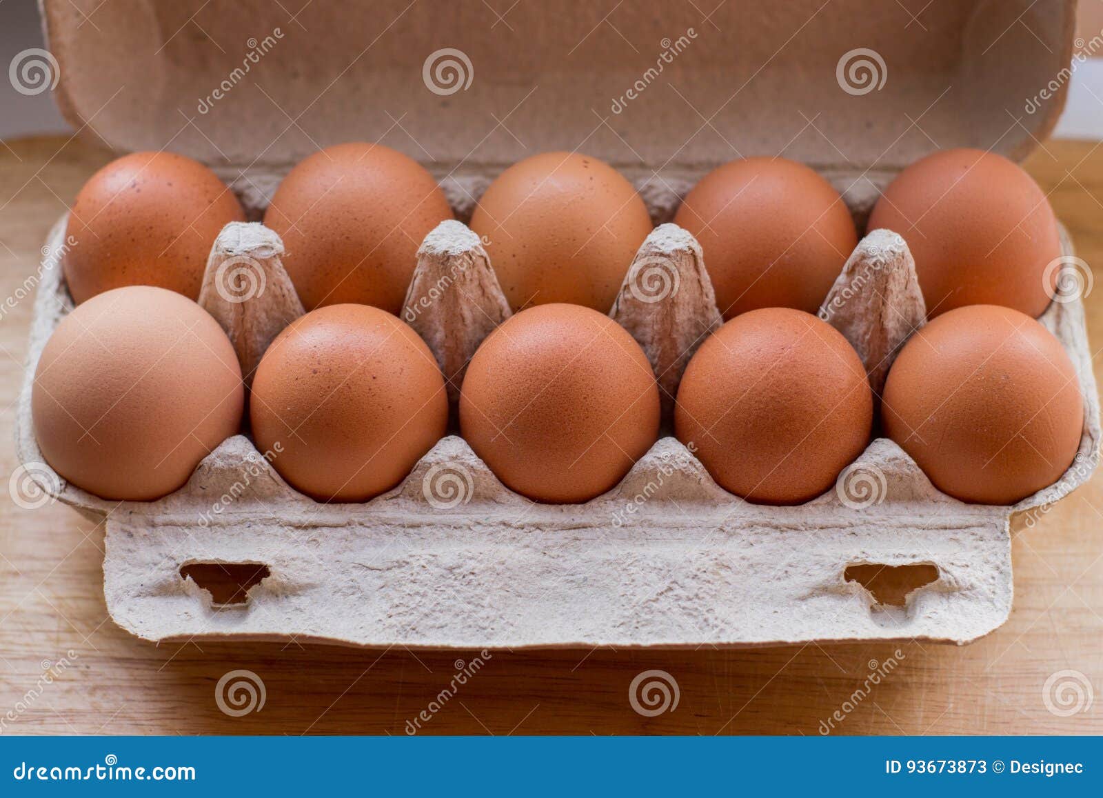 Packing Eggs in a Cardboard Box on the Table Stock Image - Image of ...