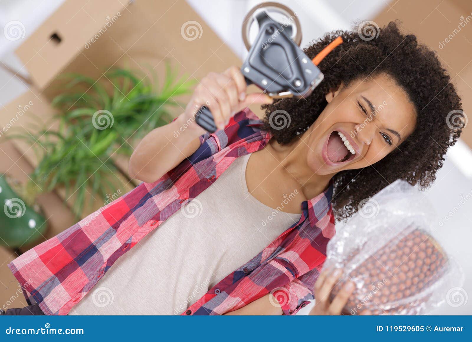 Packing the fragile items stock image. Image of working - 119529605