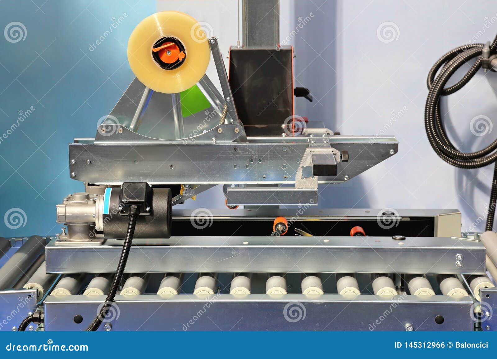 Packing Machine Conveyor stock photo. Image of conveyor - 145312966