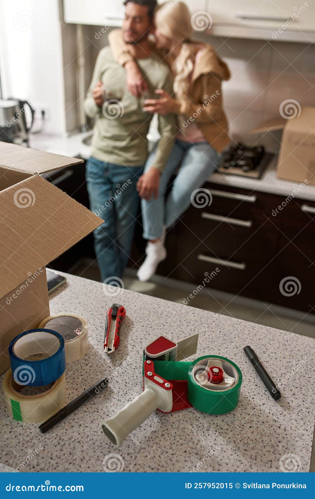Packing Objects and Box on Table with Blur Couple Stock Image - Image of daytime, hugging: 257952015