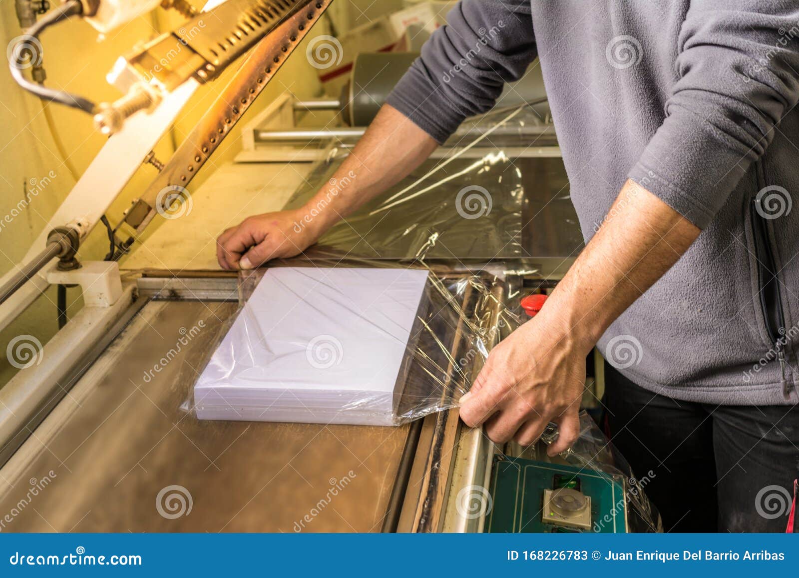 Packing Paper with Plastic Machine Stock Image - Image of equipment ...
