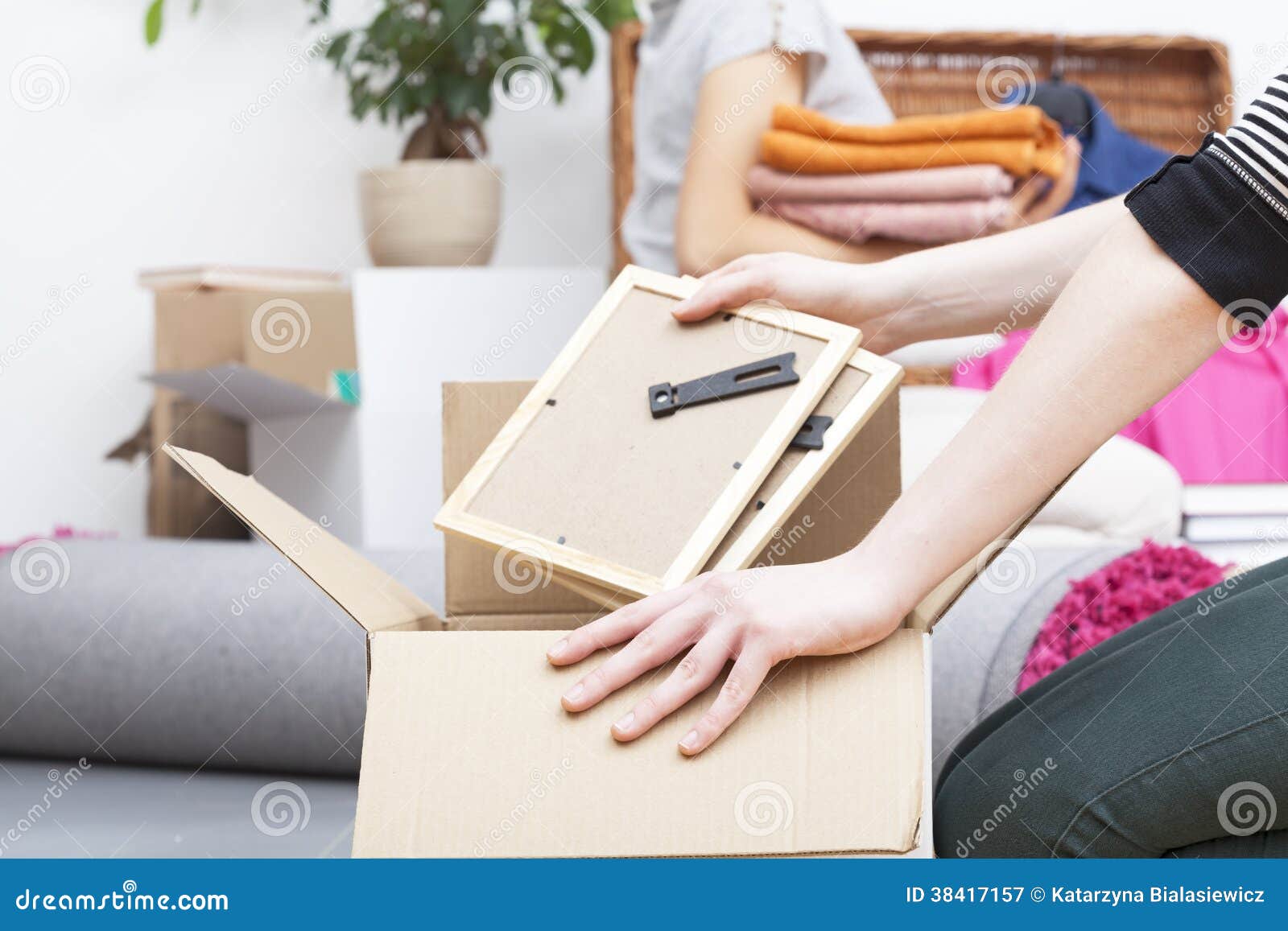 Packing photo frames stock image. Image of apartment - 38417157