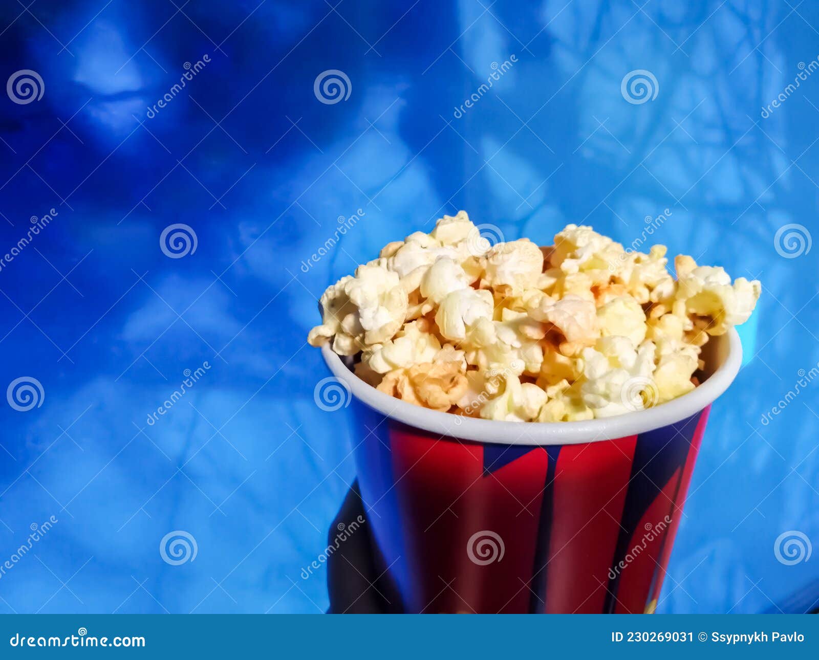 Packing Popcorn in Front of the TV Screen Stock Image - Image of ...