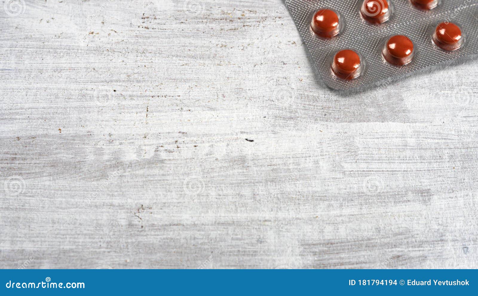 Packing with Red Pills on a Gray Structural Background Stock Photo ...