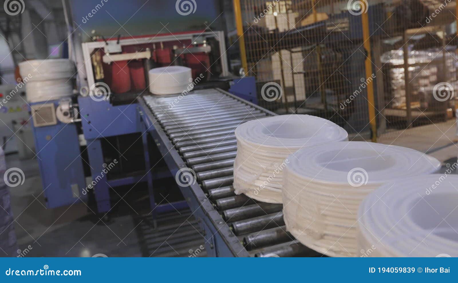 Packing Reels with Cable on a Modern Conveyor, Automatic Packing Reels ...