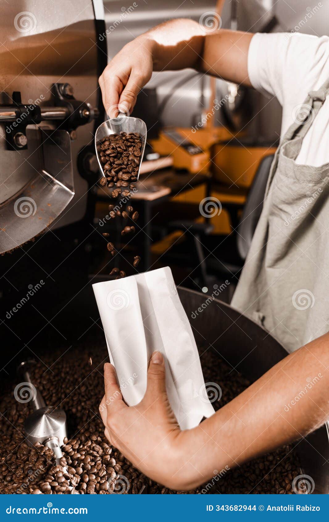 Packing Roasted Coffee Beans into a Craft Bag. Pouring Fried Coffee ...
