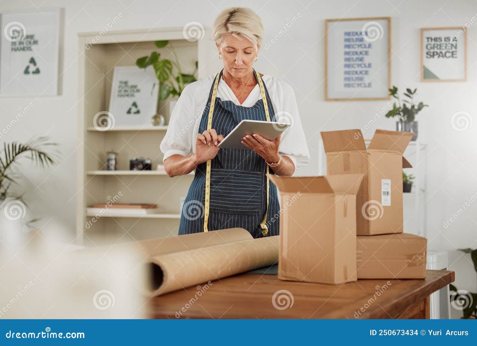 Packing, Shipping and Logistics in a Modern Workplace. Boxes Being ...