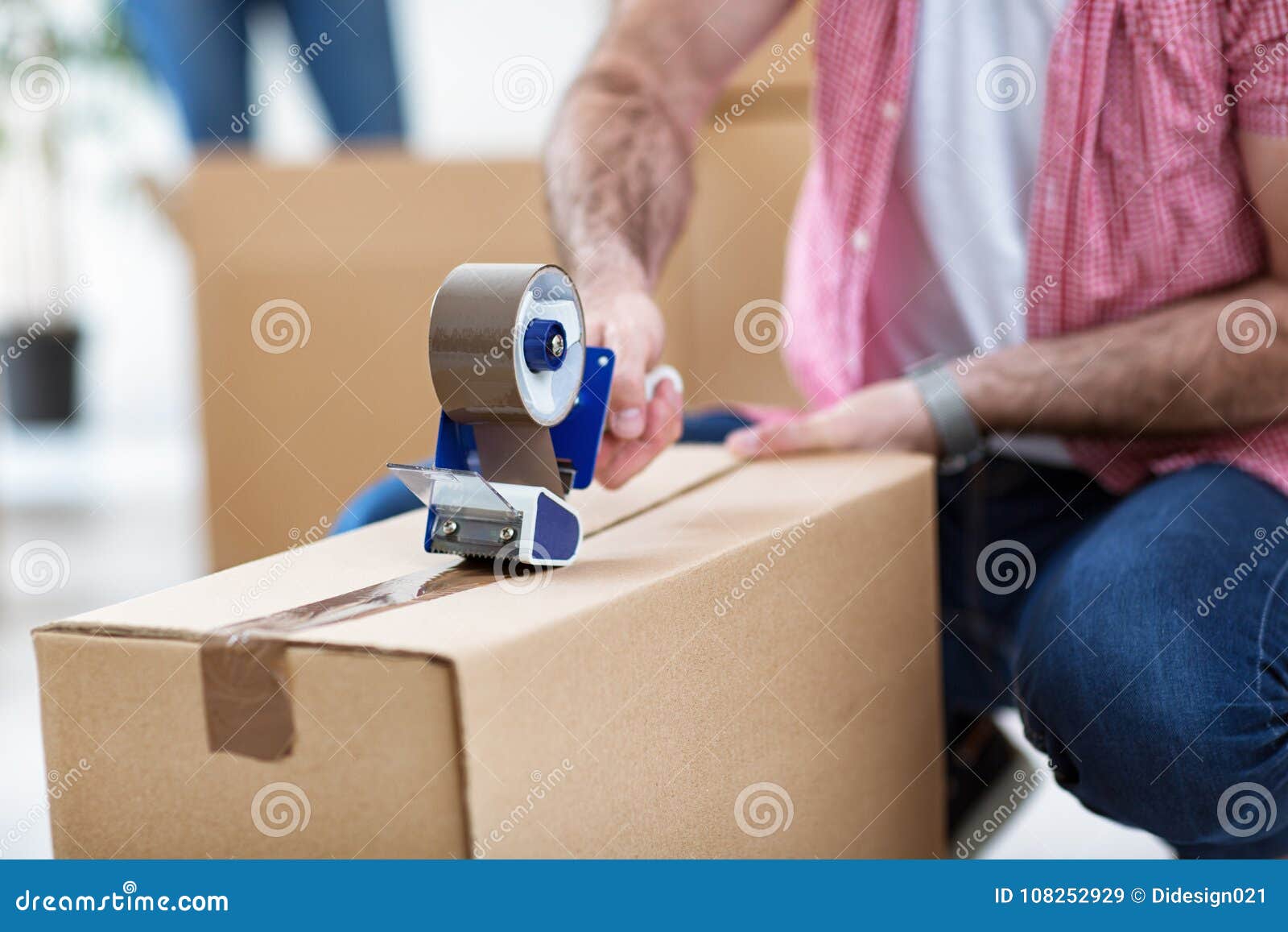 Packing Things in Boxes and Using Dust Tape Stock Image - Image of flat ...