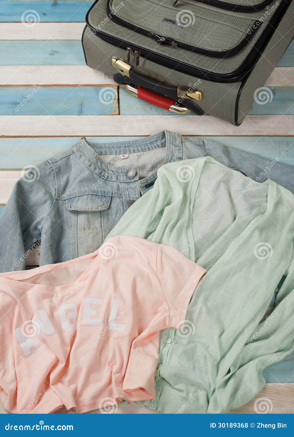 Packing stock photo. Image of shirts, traveler, suitcase - 30189368