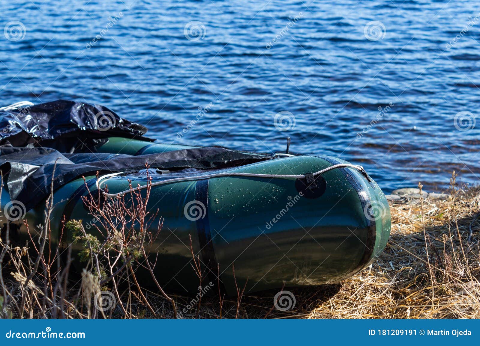 Pack Raft Besides a Lake in Grass Stock Image - Image of pack, awesome ...