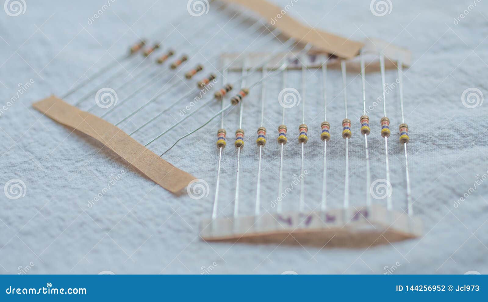 Packs of Electrical Resistor Components Against a White Background ...