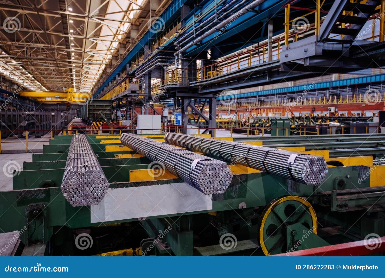 Packs of Rolled Metal Bars on Roller Conveyor Stock Image - Image of ...