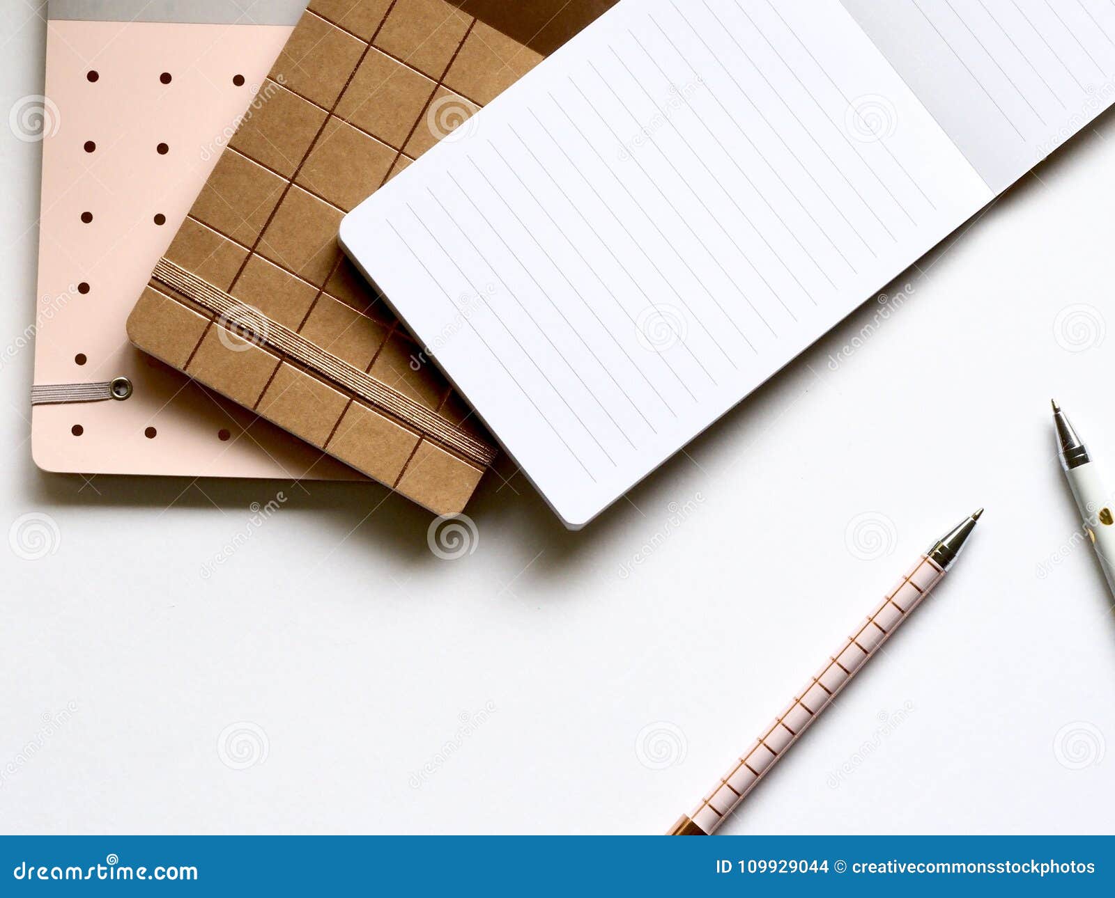 Pad With Pens On Table Picture. Image: 109929044