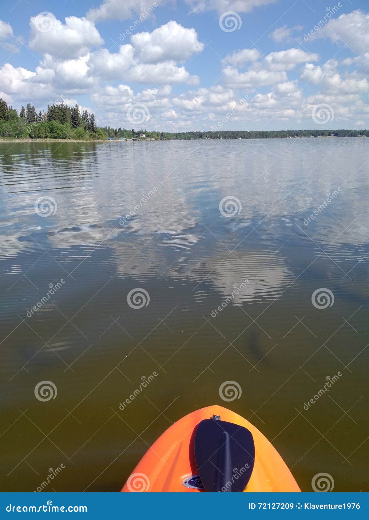 Paddle board on water stock image. Image of shoreline - 72127209