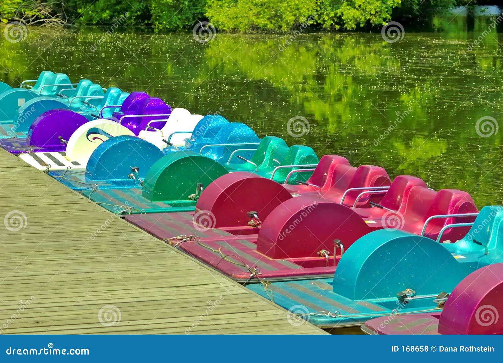 Paddle Boats stock photo. Image of float, paddle, nature - 168658