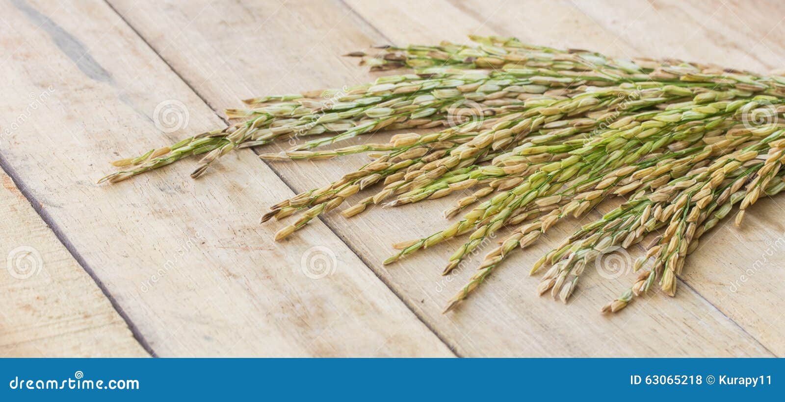 Paddy pile on wood stock photo. Image of agriculture - 63065218