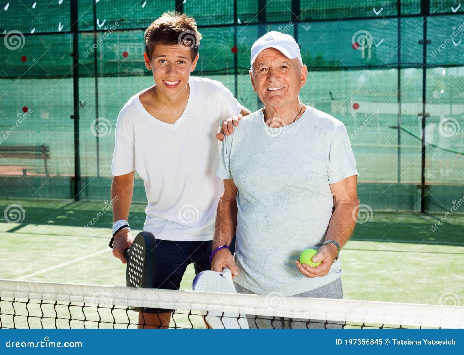 Padel Players of Different Generations Posing on Padel Court Stock ...